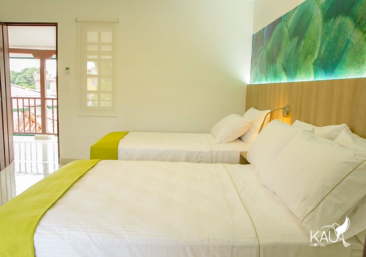 Habitación Triple - Kau Hotel